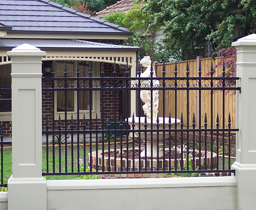 Fence in classic style with wrought iron railing.Entrance to the house ...
